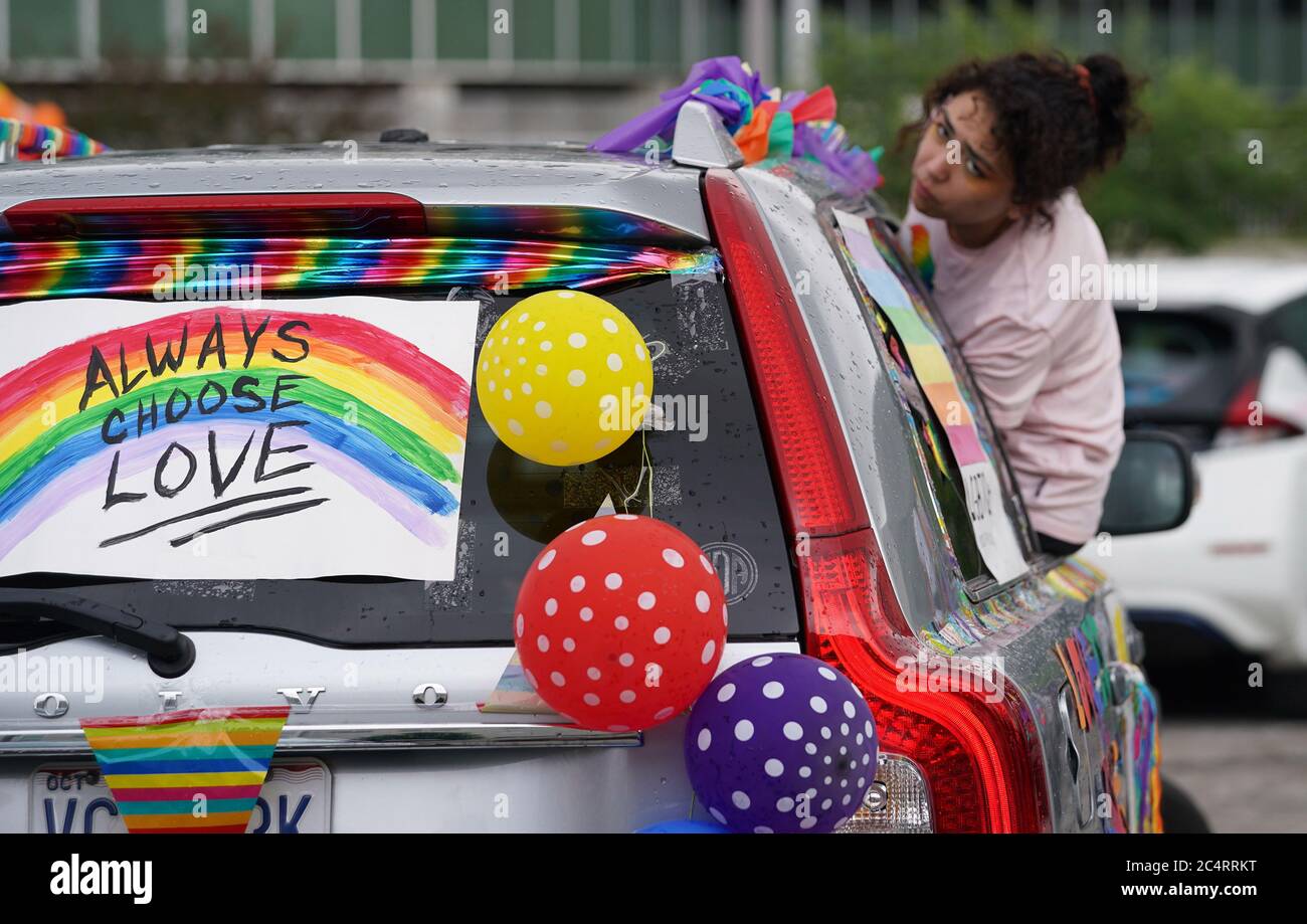St. Louis, United States. 28th June, 2020. A parade participant ...