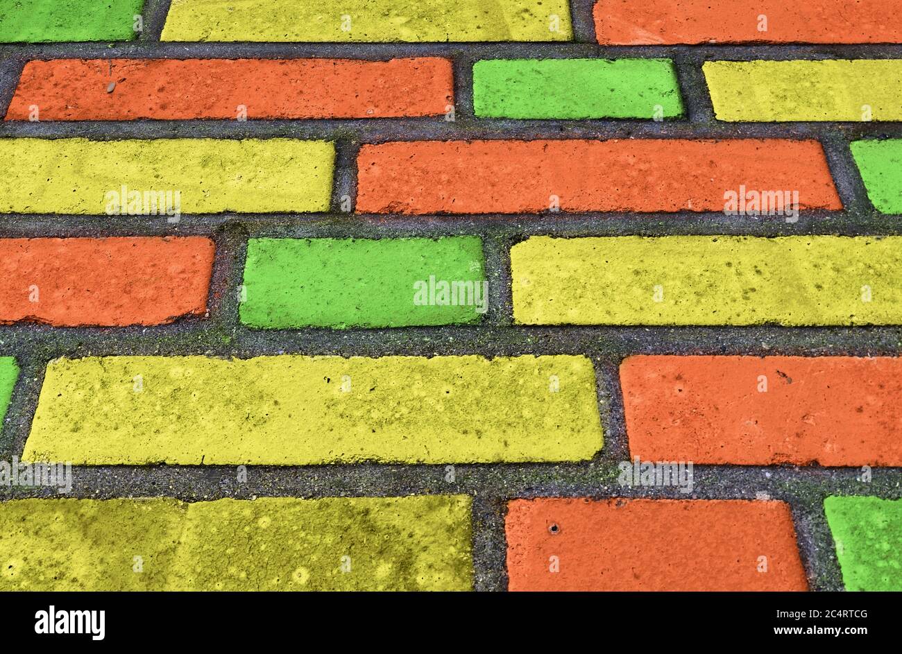 Rainbow banner on brick wall hi-res stock photography and images - Alamy