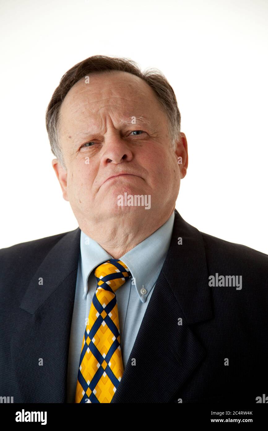 Older man in a suit on a white background Stock Photo - Alamy