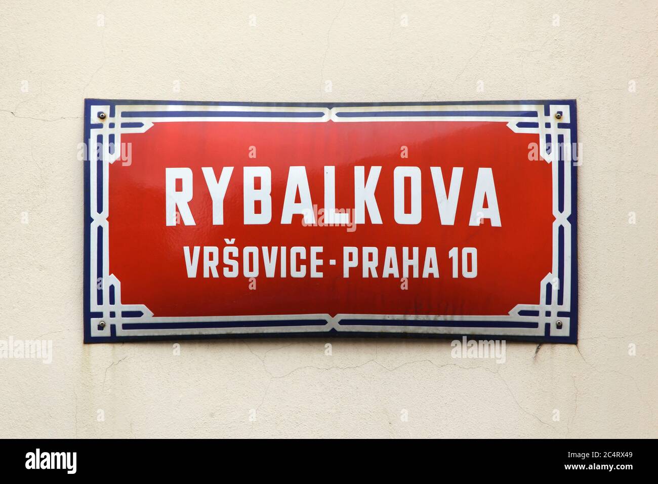 Rybalkova Street. Traditional red street sign in Vršovice district in ...