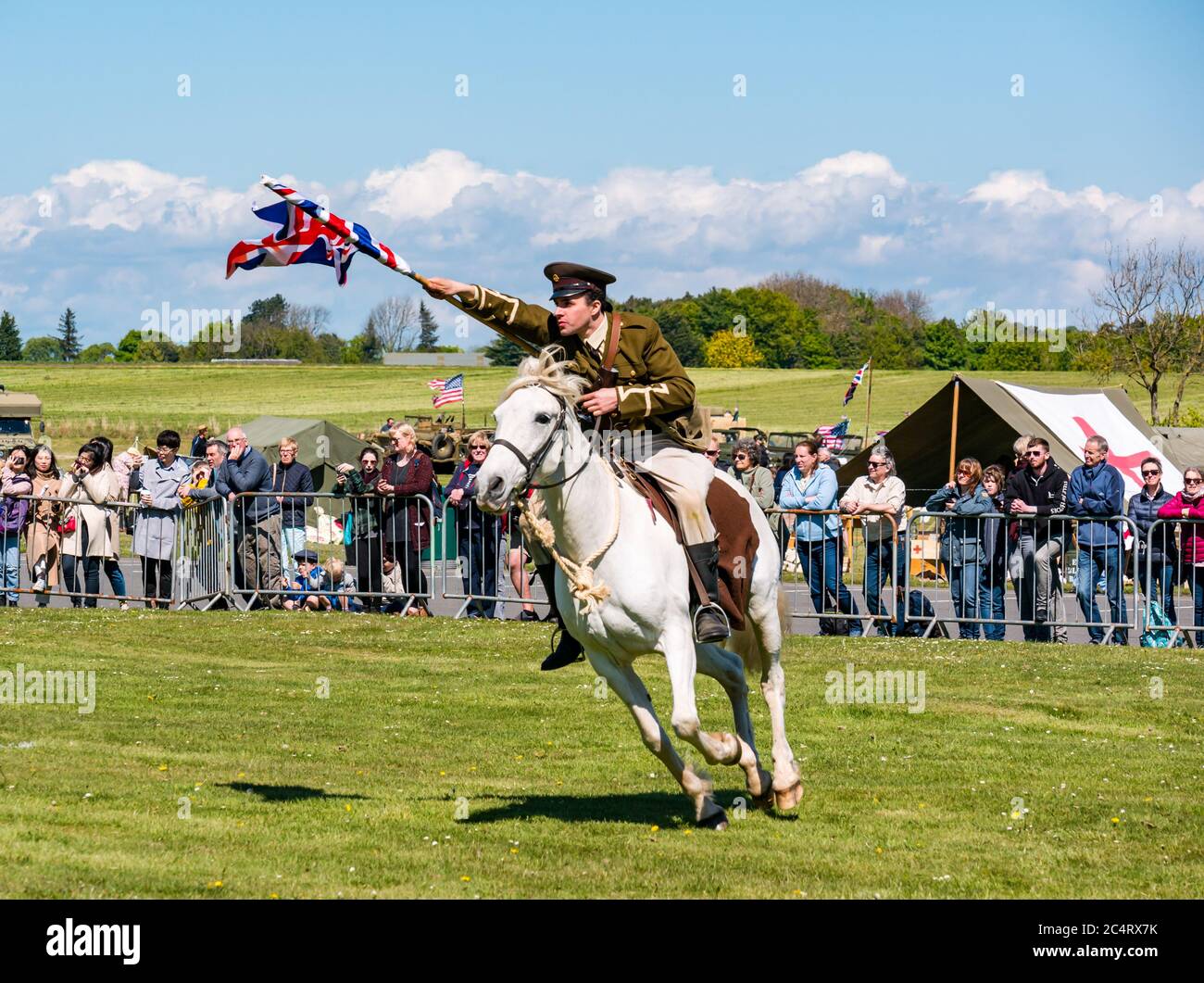 Les Amis D'Onno equestrian stunt team with soldier charging on ...