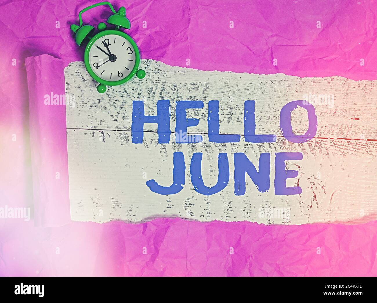 Writing note showing Hello June. Business concept for a new month to ...