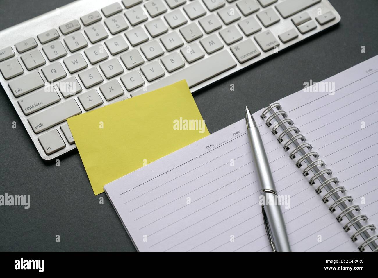 Text laptop pen notepad hi-res stock photography and images - Alamy