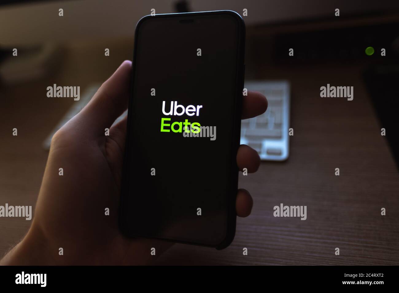 Uber Eats logo on the smartphone screen Stock Photo - Alamy