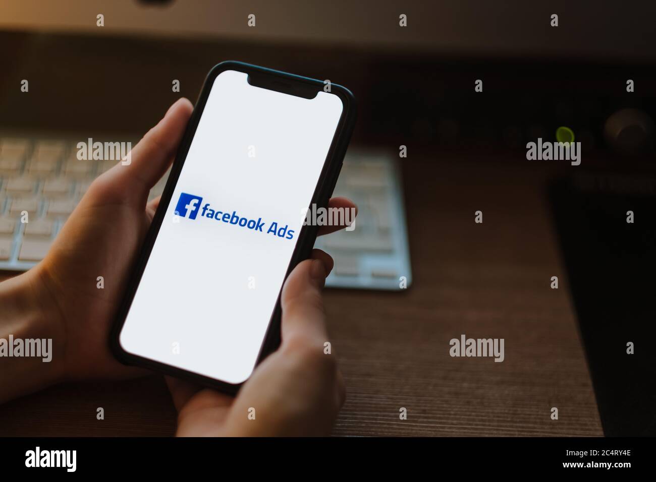 Facebook ads logo on the screen Stock Photo - Alamy