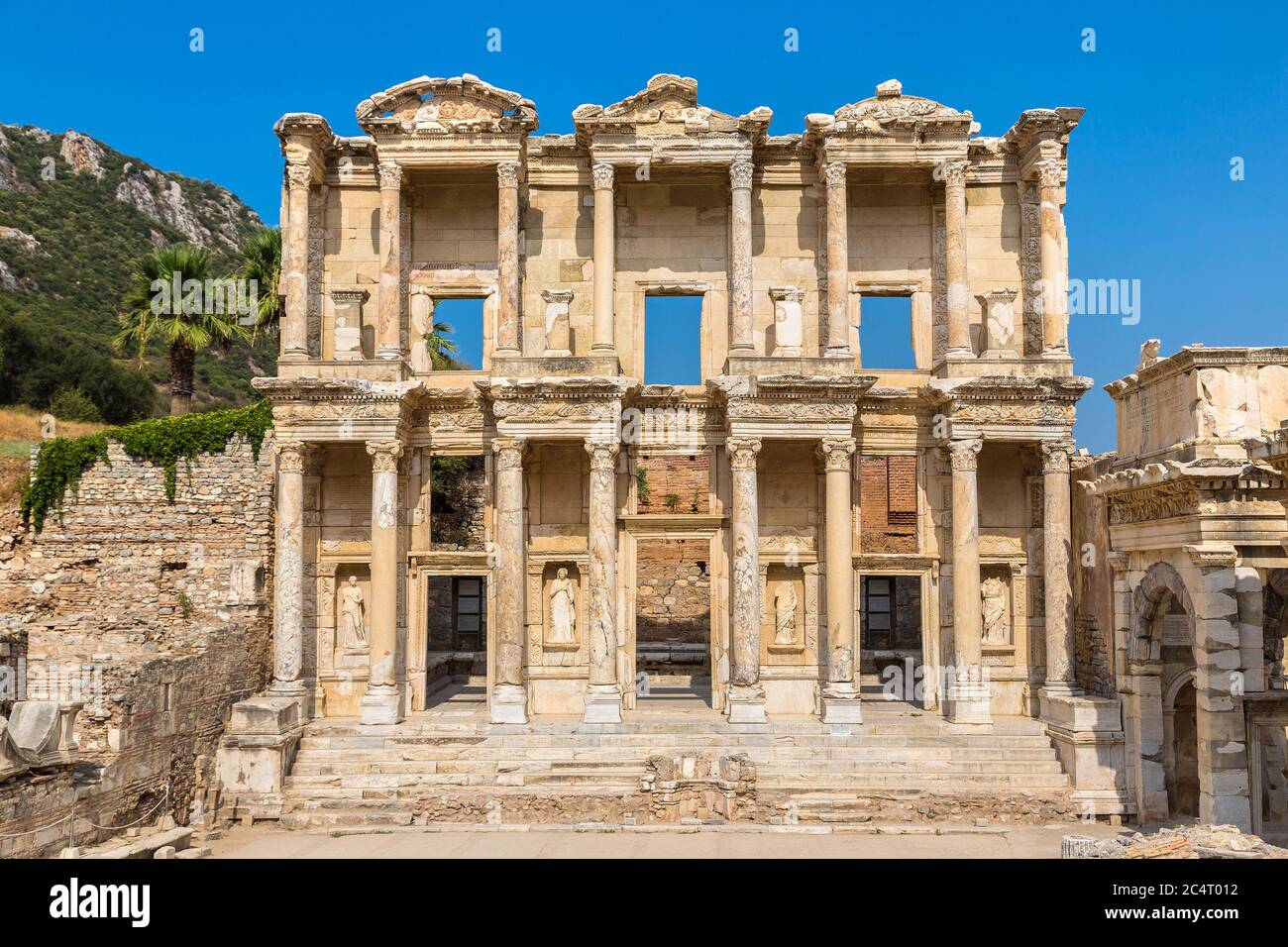 Ruins of Celsius Library in ancient city Ephesus, Turkey in a beautiful ...