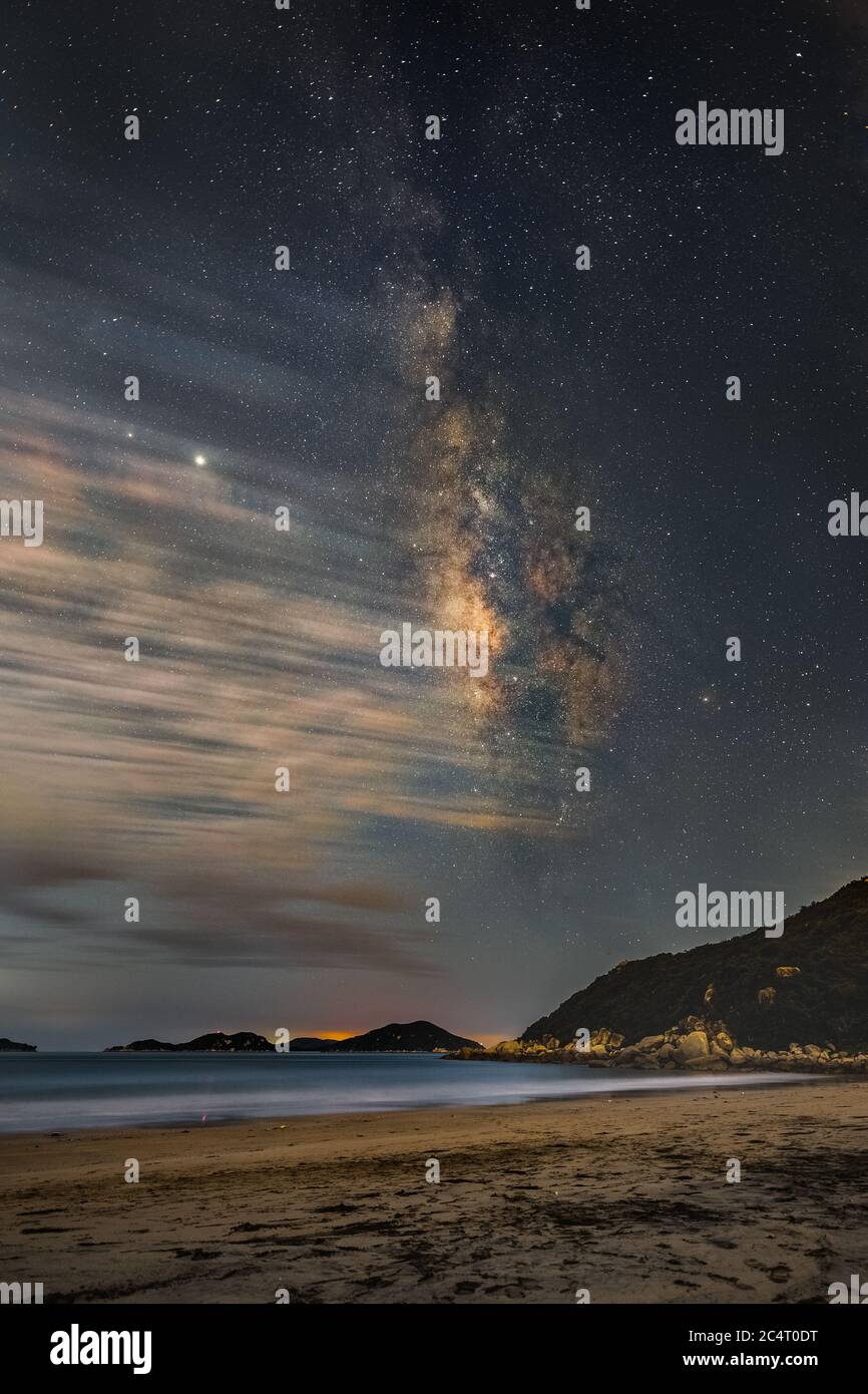Beautiful scenery of Milky Way Galaxy in the night sky over a landscape ...