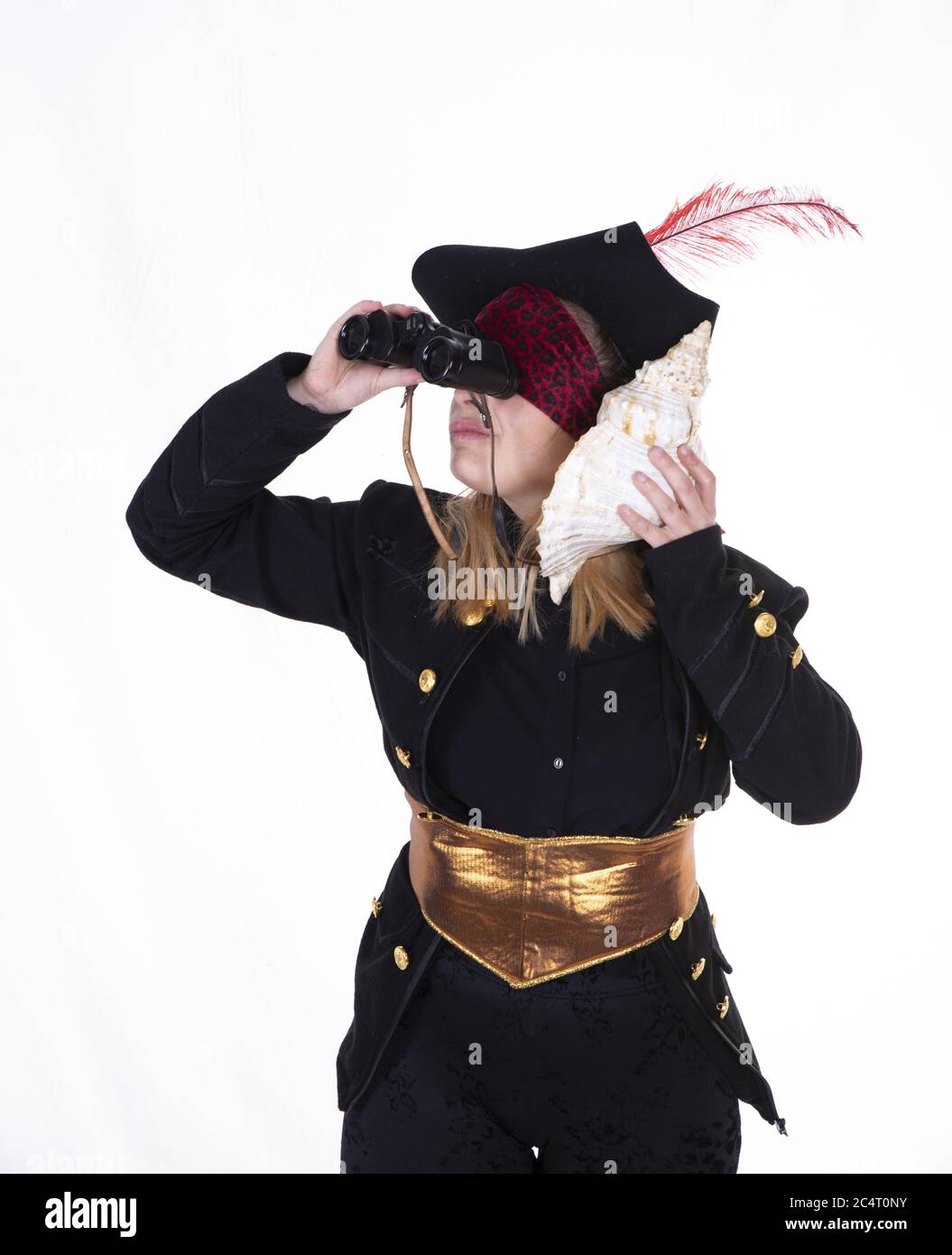 A female in a pirate costume watching with binoculars and holding a big ...