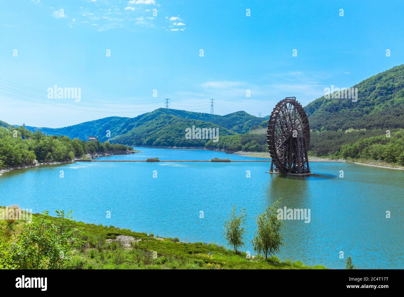 Large wooden waterwheel blue hi-res stock photography and images - Alamy