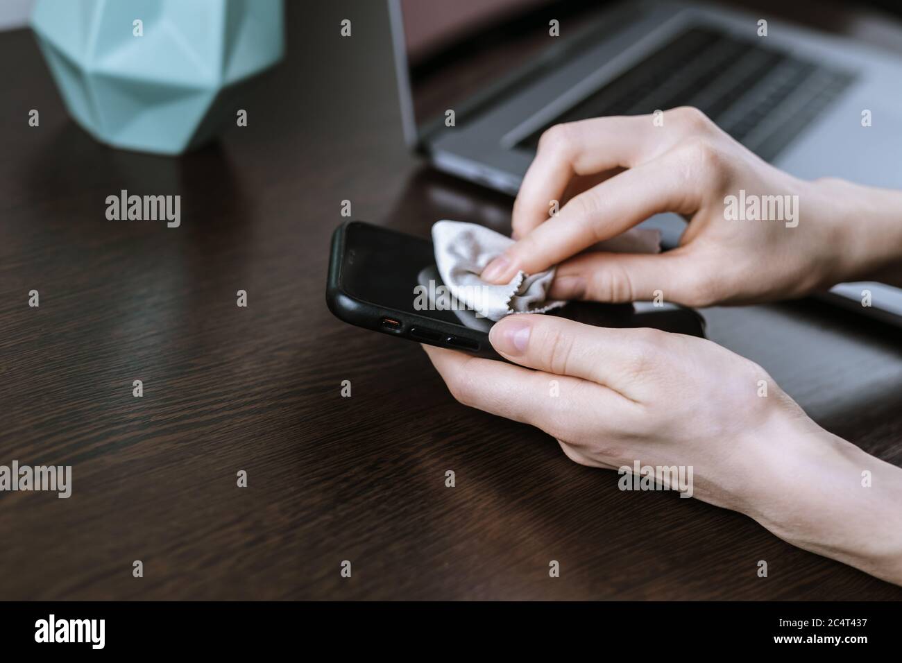 Cleaning the smartphone screen with a fiber cloth Stock Photo - Alamy