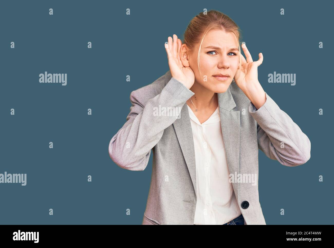 Attractive blonde woman trying hear hi-res stock photography and images ...