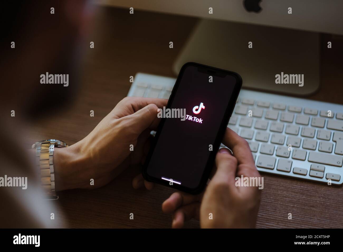 Man use Tik Tok app, TikTok logo on the screen Stock Photo - Alamy