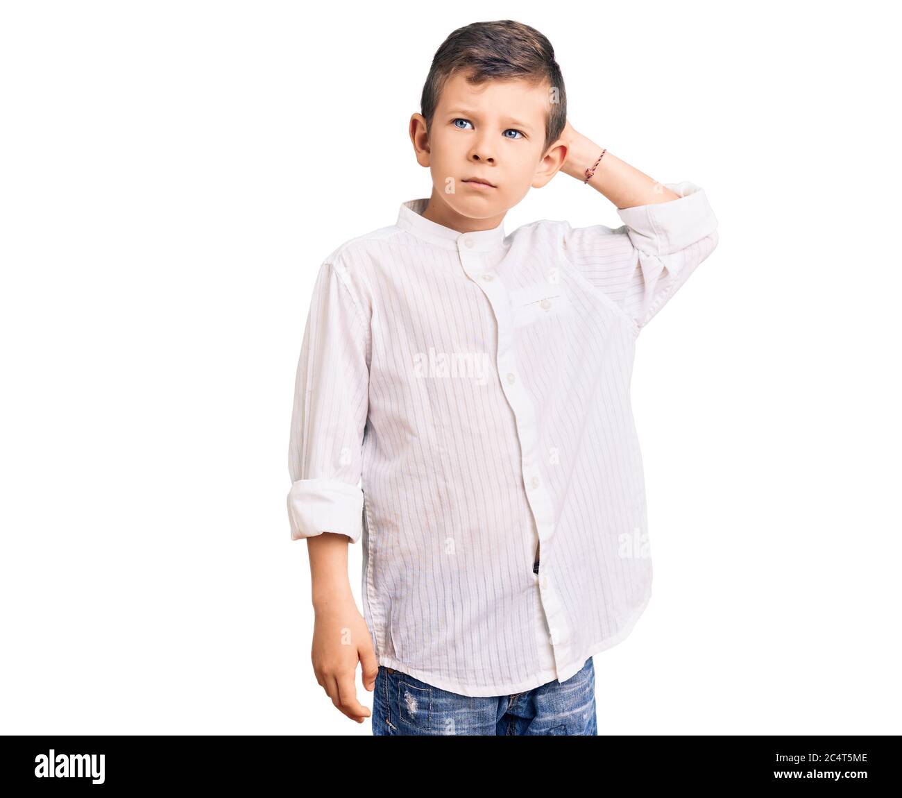 Cute blond kid wearing elegant shirt confuse and wondering about ...