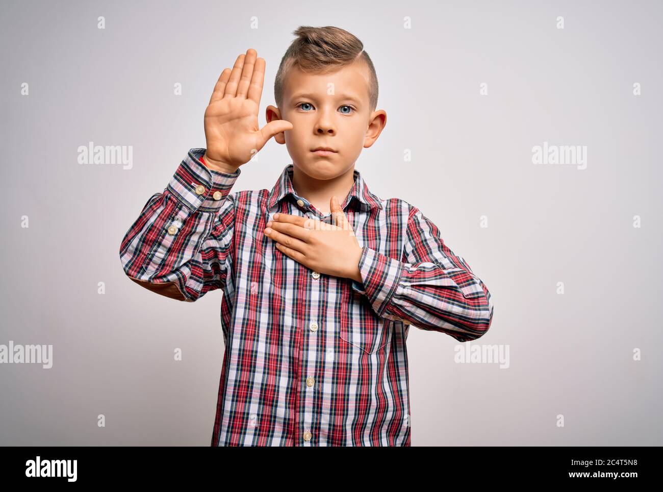 Young little caucasian kid with blue eyes wearing elegant shirt ...