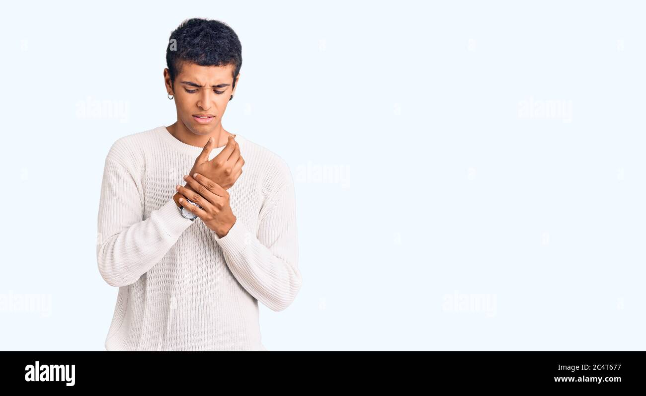 African painful wrist hi-res stock photography and images - Alamy