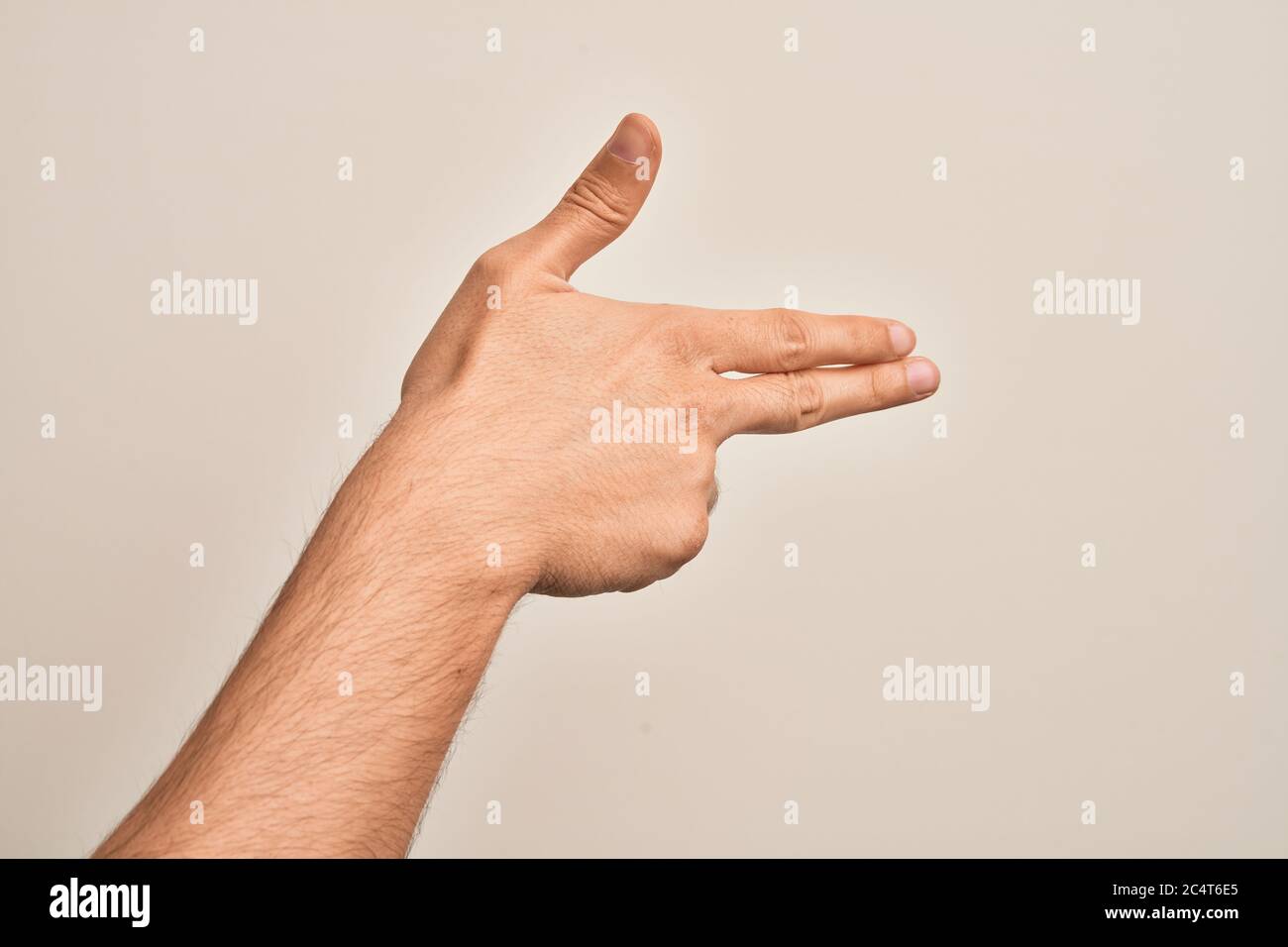 Hand of caucasian young man showing fingers over isolated white ...