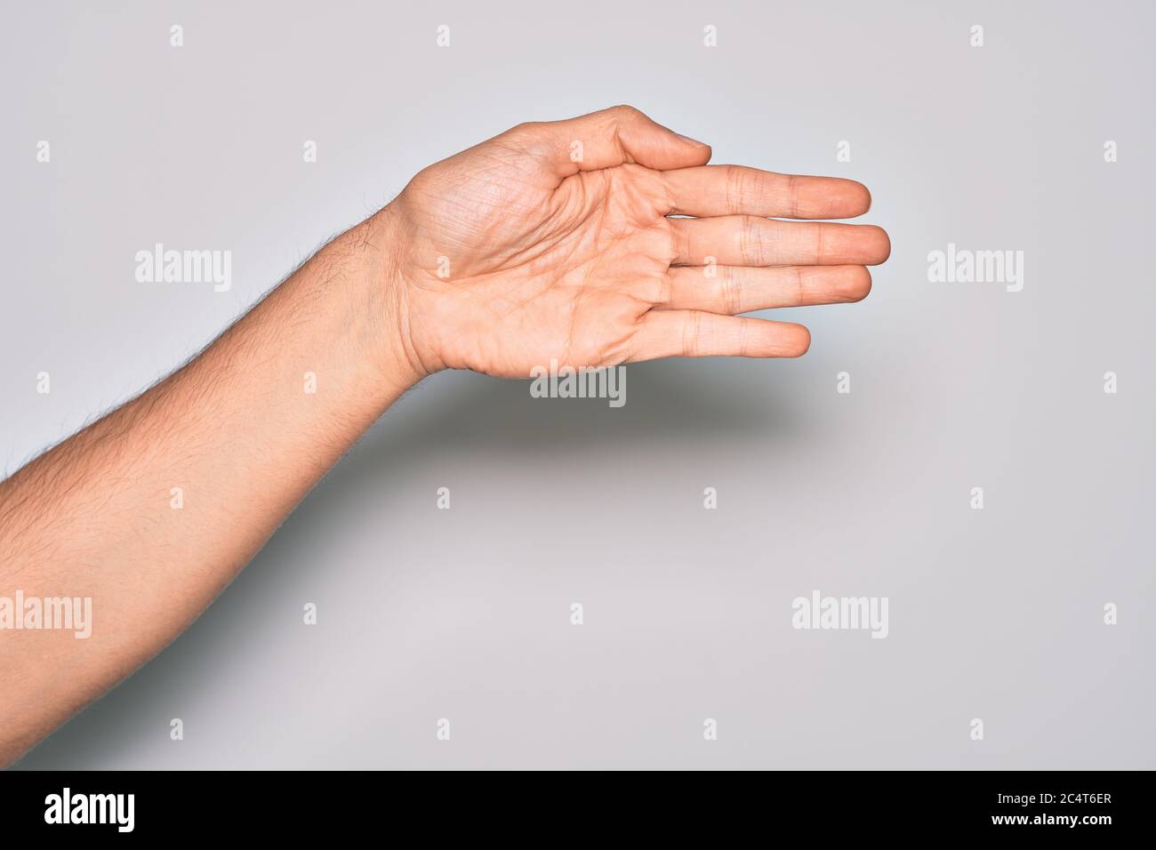 Hand of caucasian young man showing fingers over isolated white ...