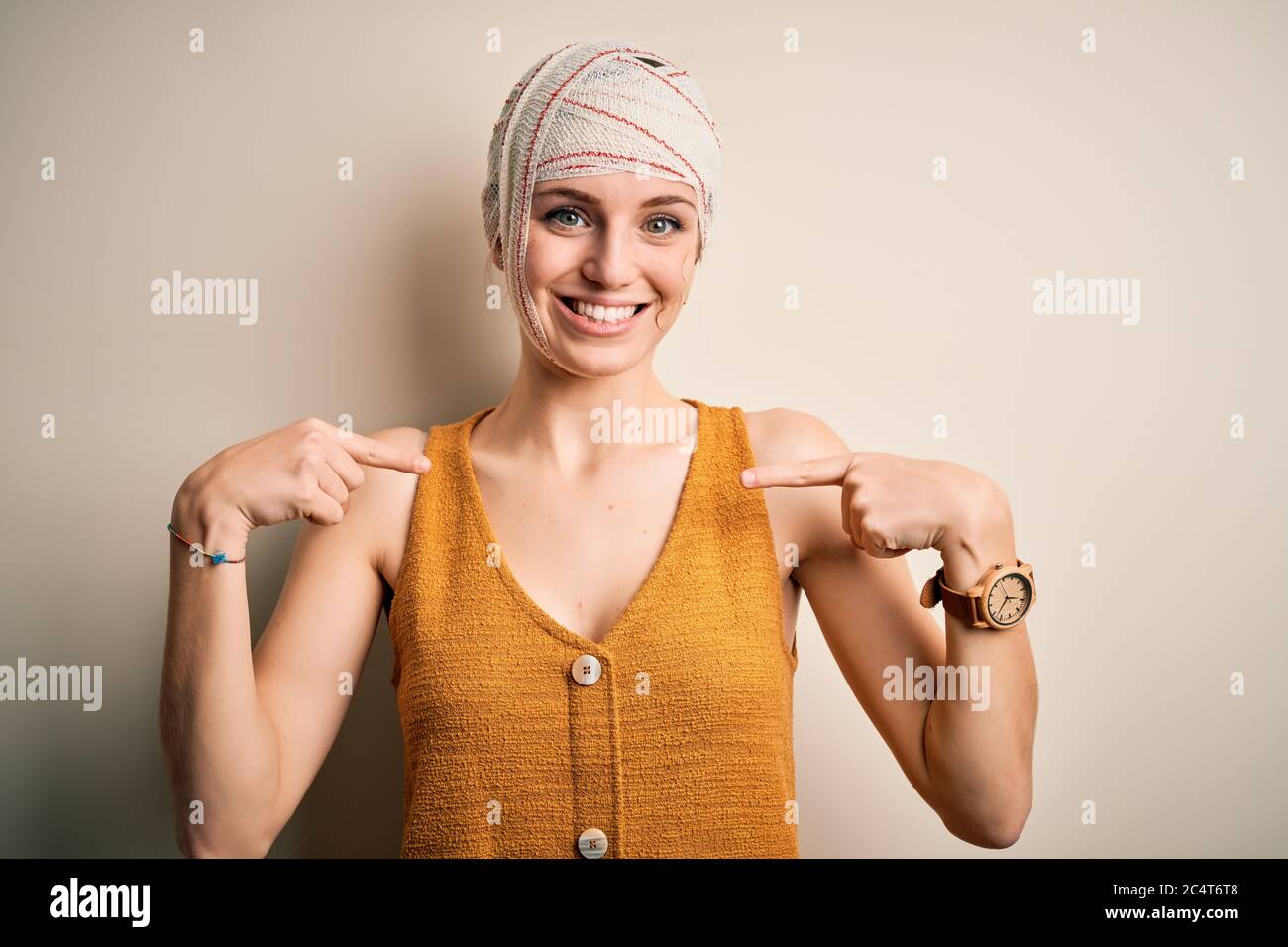 Young beautiful redhead woman injured for accident wearing bandage on ...