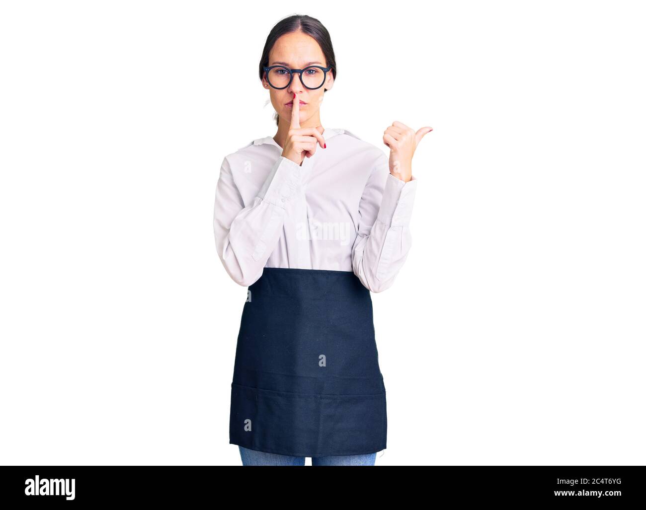 Beautiful brunette young woman wearing professional waitress apron ...