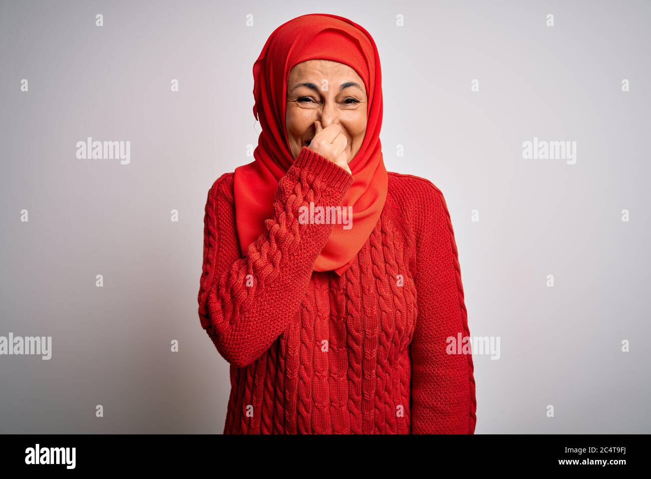 Middle age brunette woman wearing muslim traditional hijab over ...