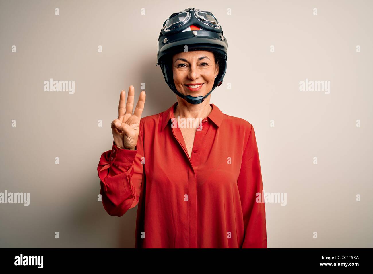 Old woman wearing helmet isolated hi-res stock photography and images ...