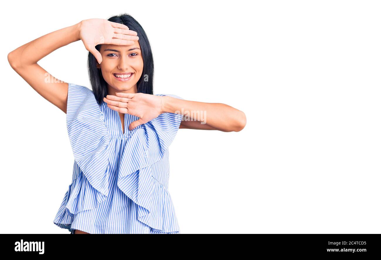 Young beautiful latin girl wearing casual clothes smiling cheerful ...