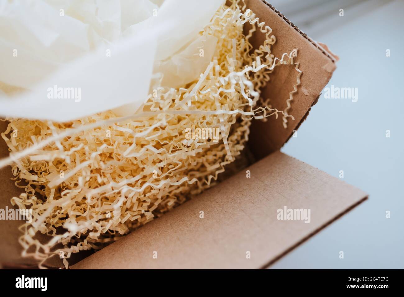 Open cardboard boxes on white background Stock Photo - Alamy