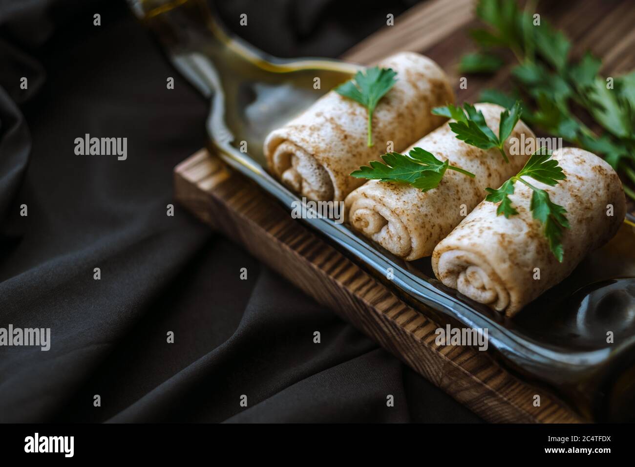 Stuffed pancakes with meat filling Stock Photo - Alamy