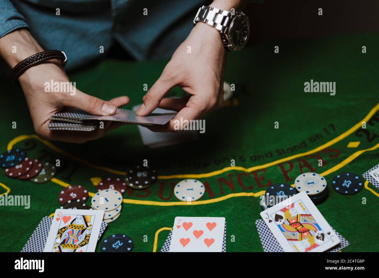 Professional croupier playing cards hi-res stock photography and images ...