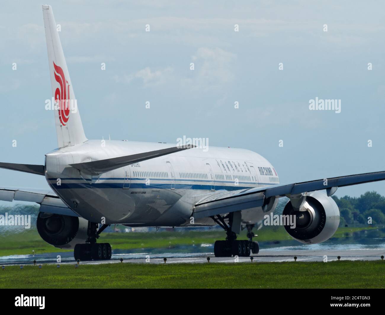 An Air China plane on the runway ready for takeoff at the Pierre ...