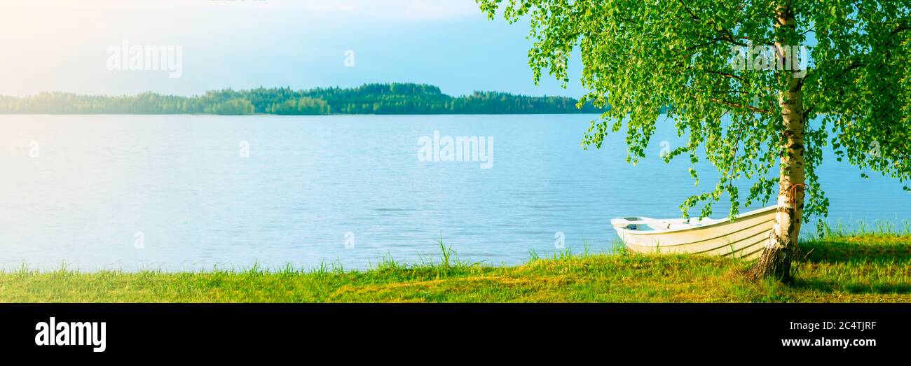 Boat tied to tree hi-res stock photography and images - Alamy
