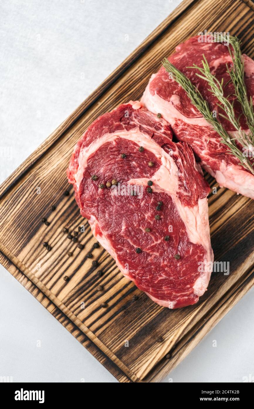 Slices raw striploin steak hi-res stock photography and images - Alamy