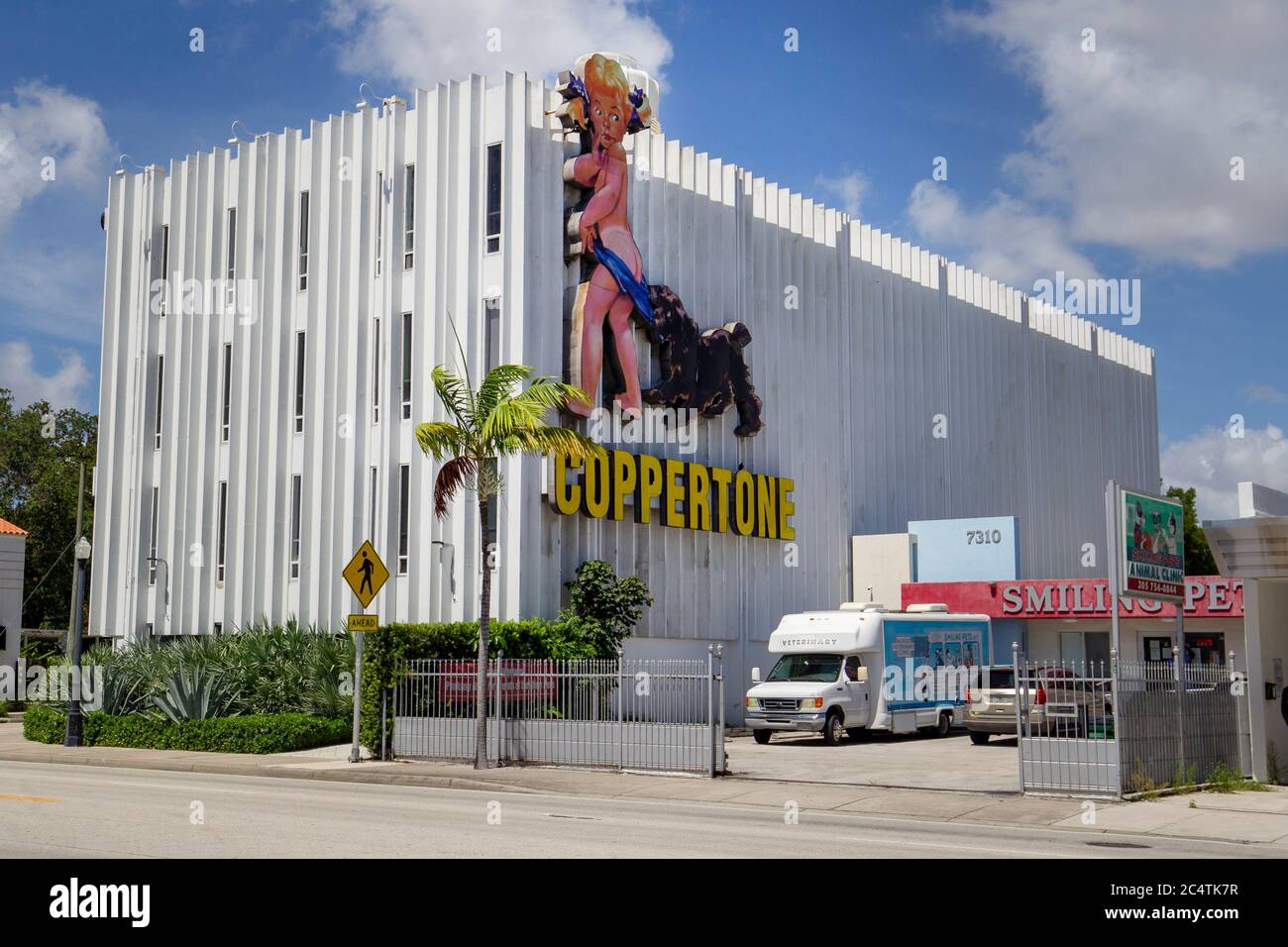 Vintage Coppertone advertising sign in Miami Florida on the side of a ...