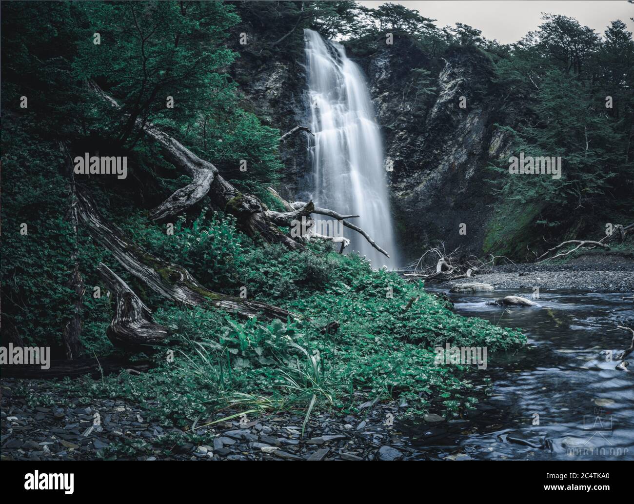 Closeup shot of a waterfall in the forest Stock Photo - Alamy