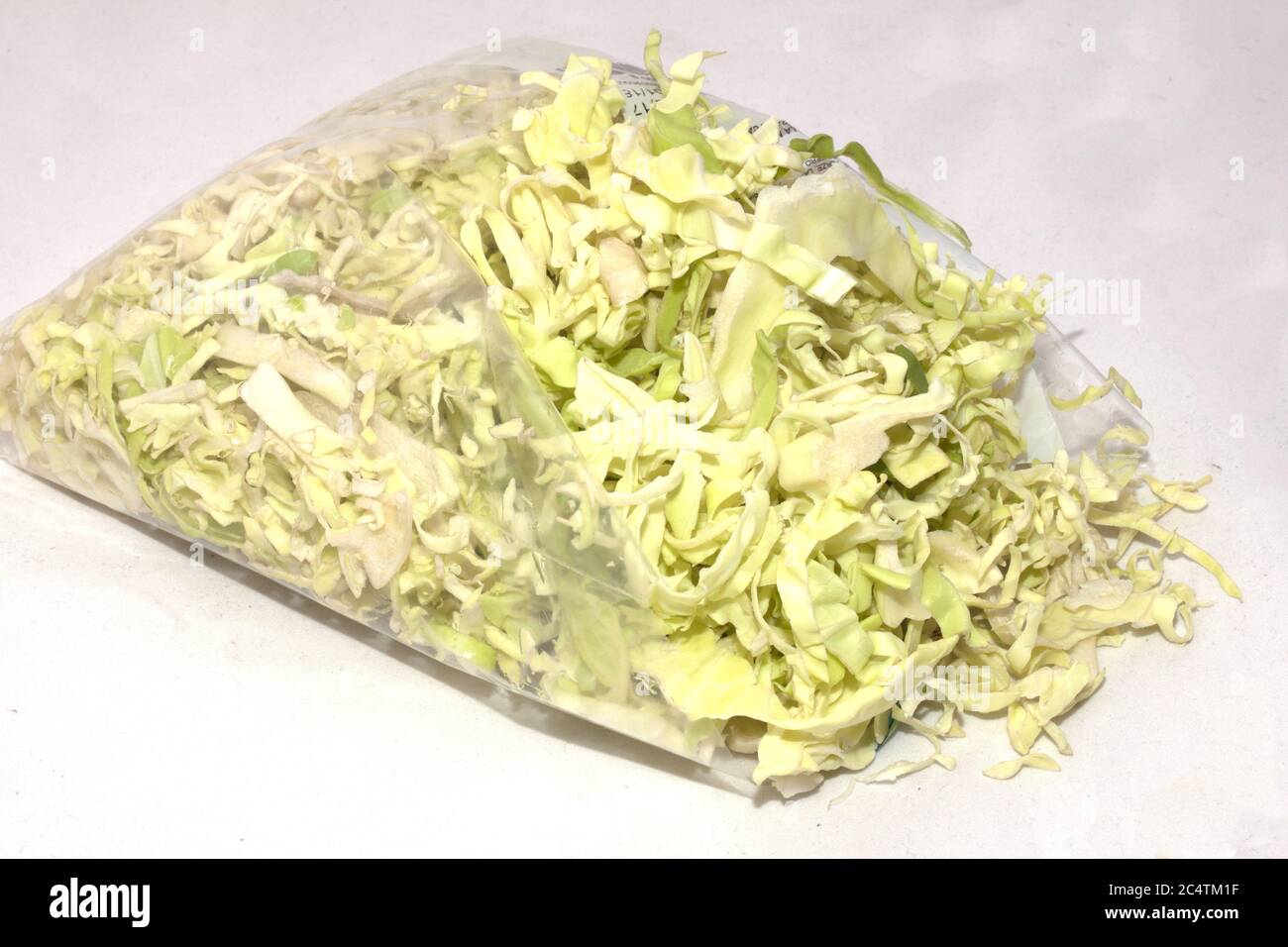 Closeup shot of cabbage vegetable cut with packaging Stock Photo - Alamy