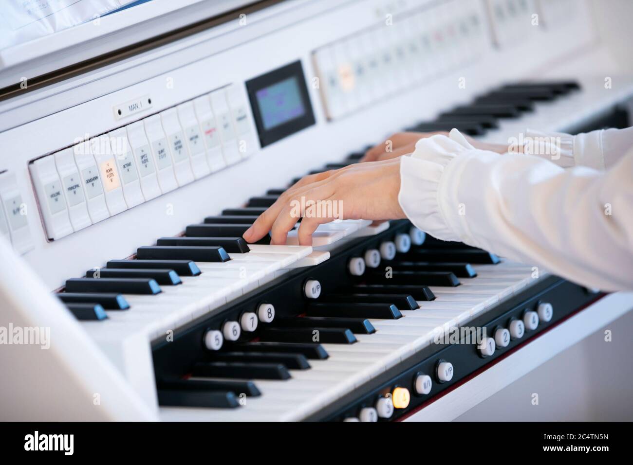 Keyboard with hands Stock Photo - Alamy