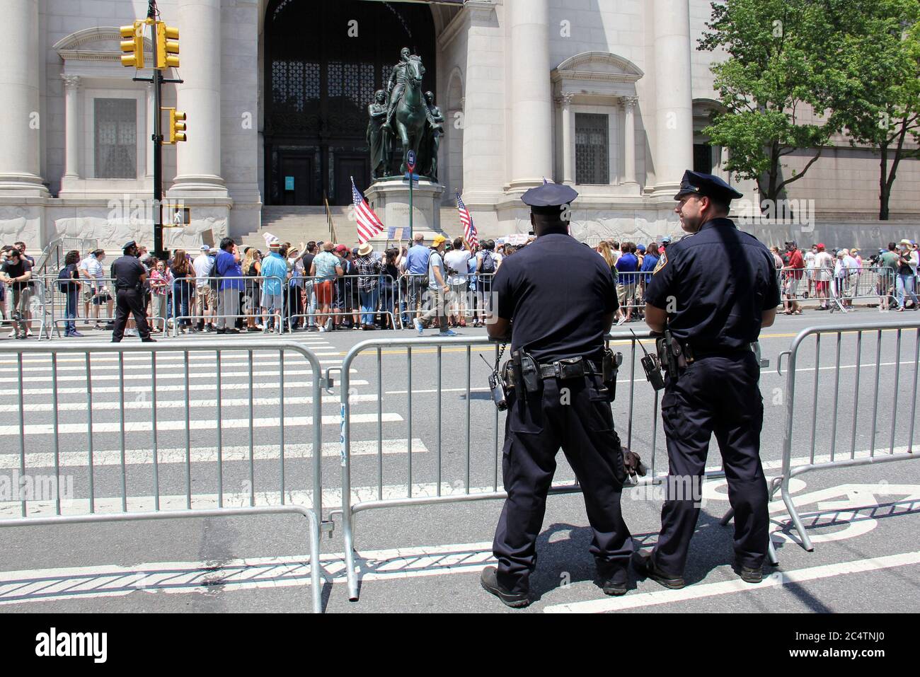 Protesters at the foot of the Theodore Roosevelt equestrian monument at ...