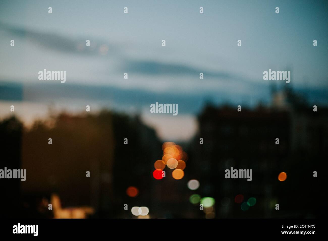 Cityscape at night with colorful bokeh lights Stock Photo - Alamy
