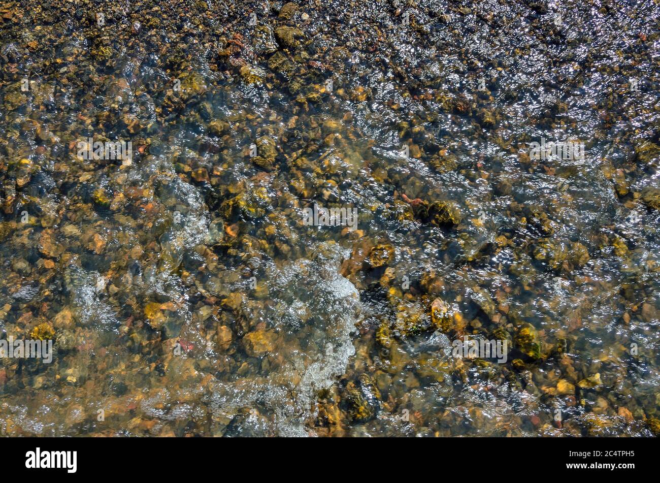 Pebbles in stream hi-res stock photography and images - Alamy
