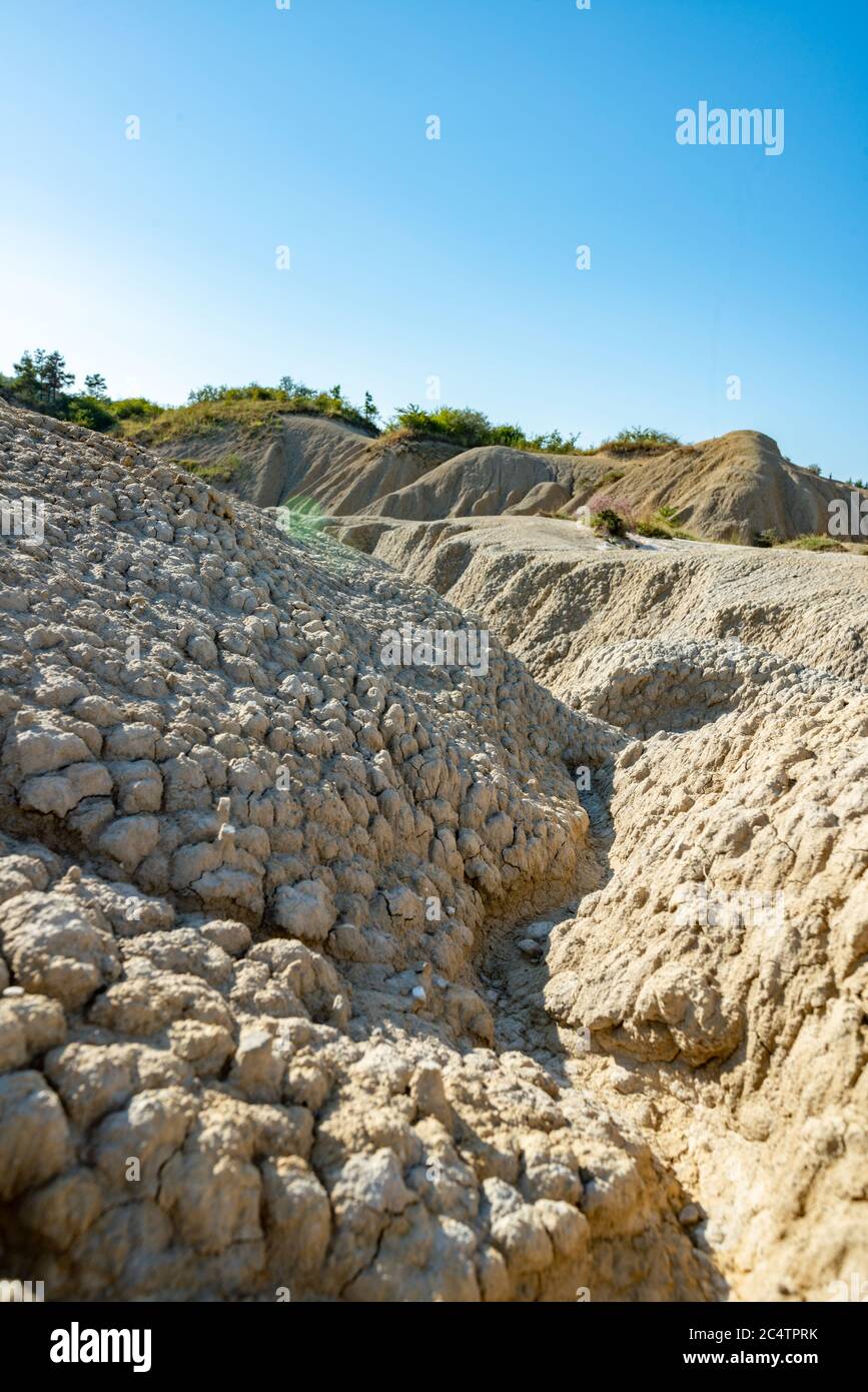 traveling to the muddy volcanoes we admire the lava and the arid earth ...