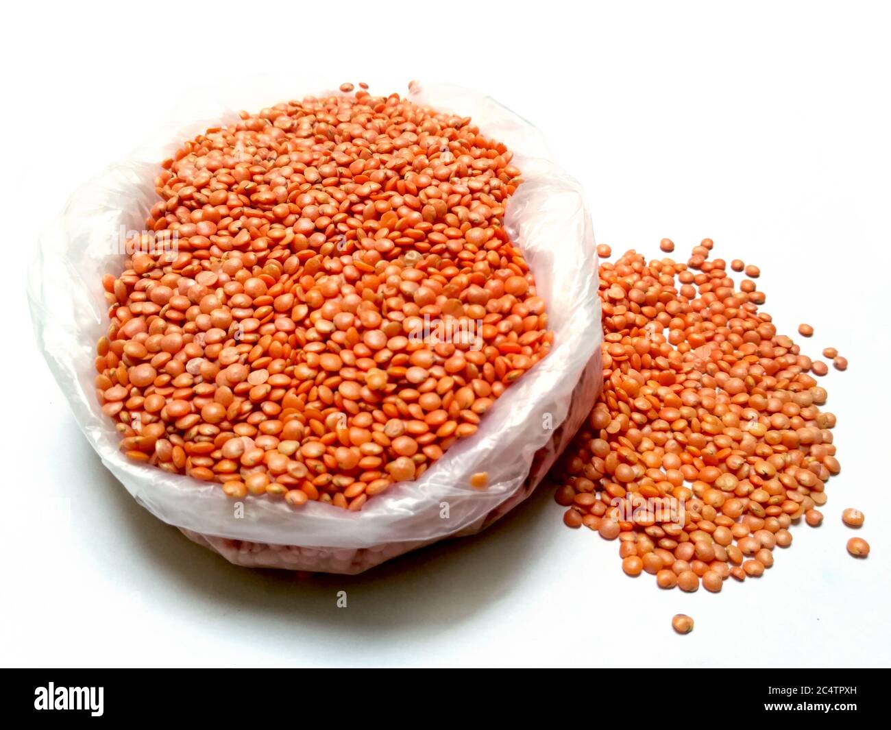 Red Lentils or Masoor Dal isolated on White Background Stock Photo - Alamy