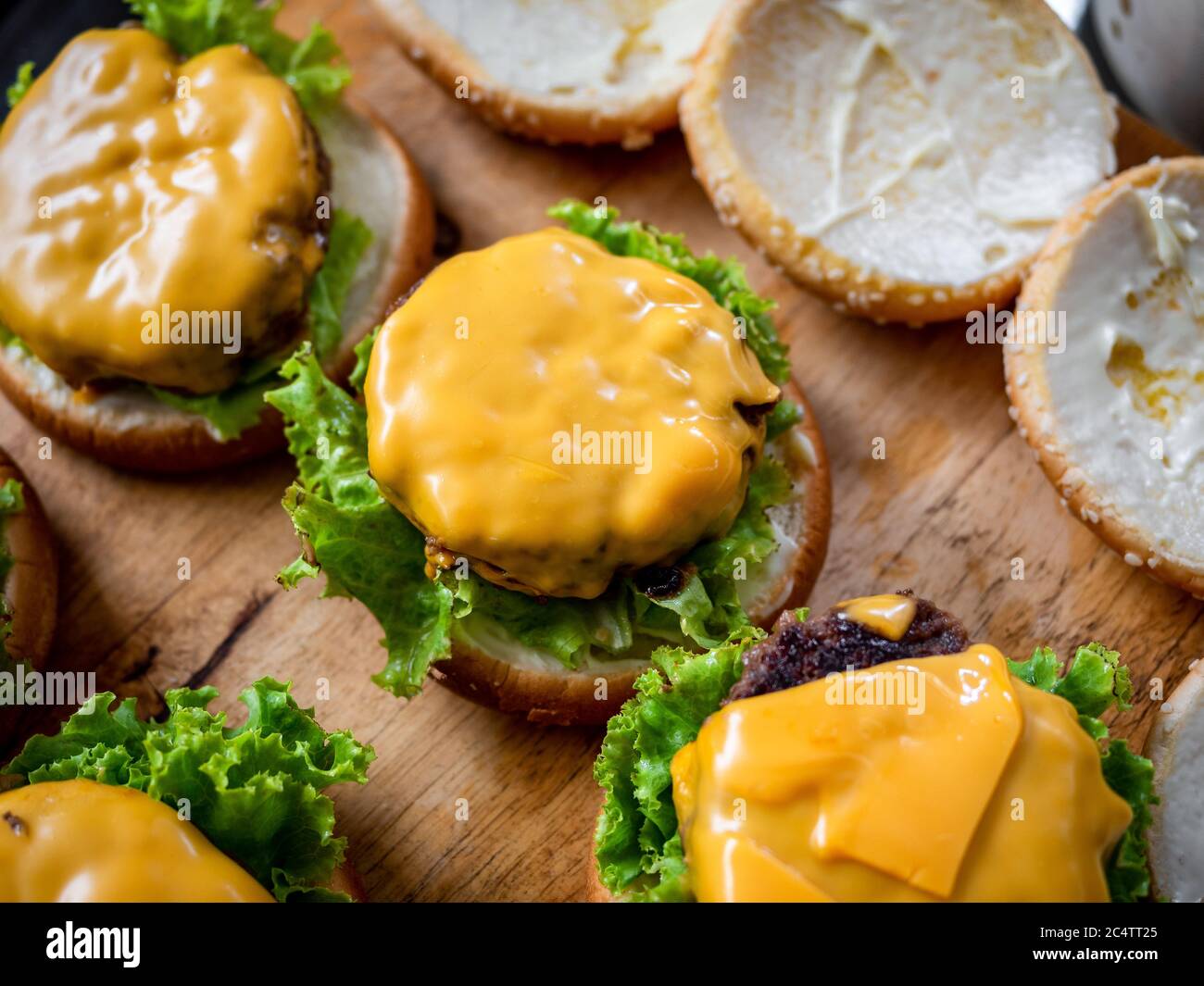 Burger making process hi-res stock photography and images - Alamy