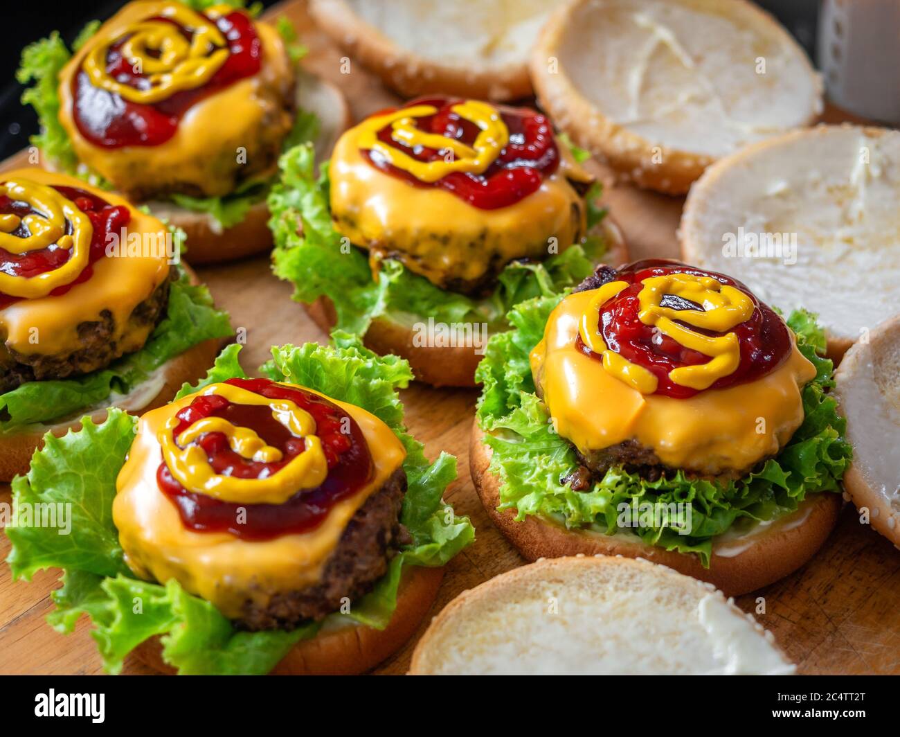 Burger making process hi-res stock photography and images - Alamy