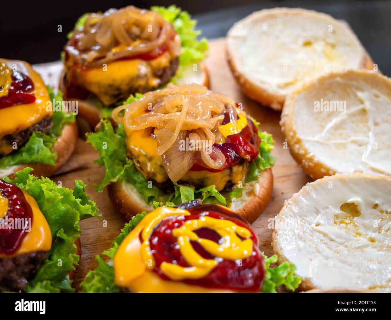 Burger making process hi-res stock photography and images - Alamy