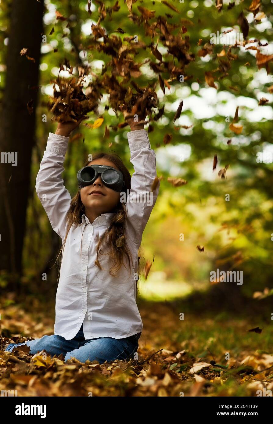 long-haired boy posing in the forest Stock Photo - Alamy