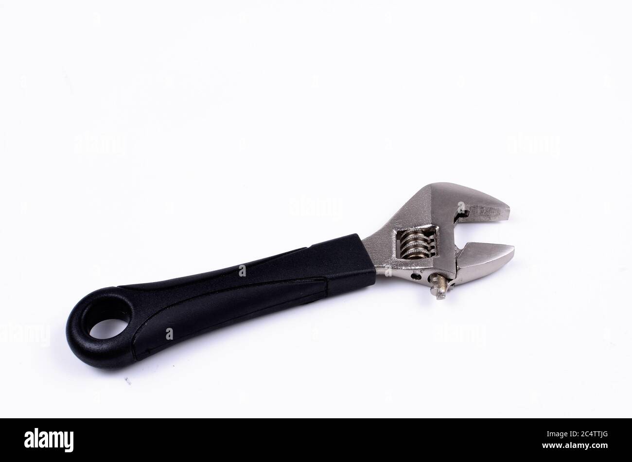 Adjustable wrench tool, isolated on white background Stock Photo - Alamy