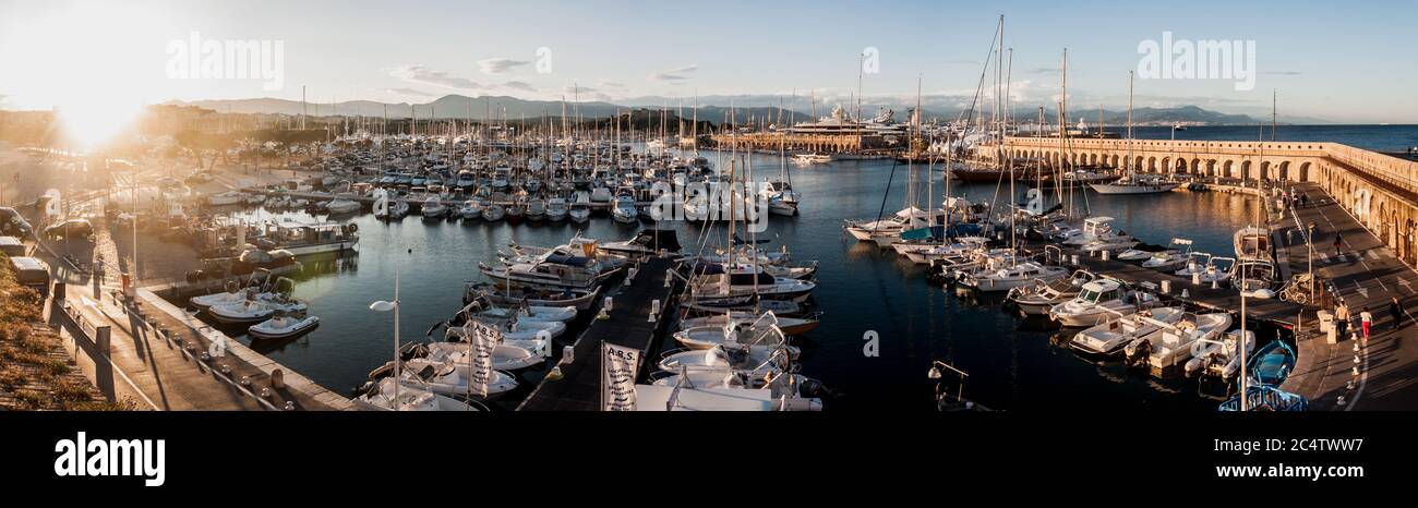 Panorama picture of white boats in a port Stock Photo - Alamy