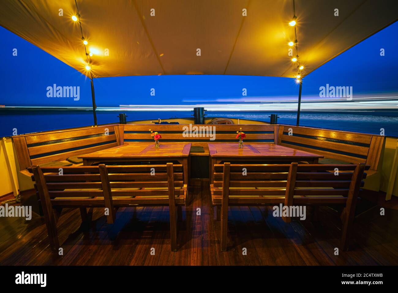 Landscape shot capturing tables taken in a floating restaurant Stock ...