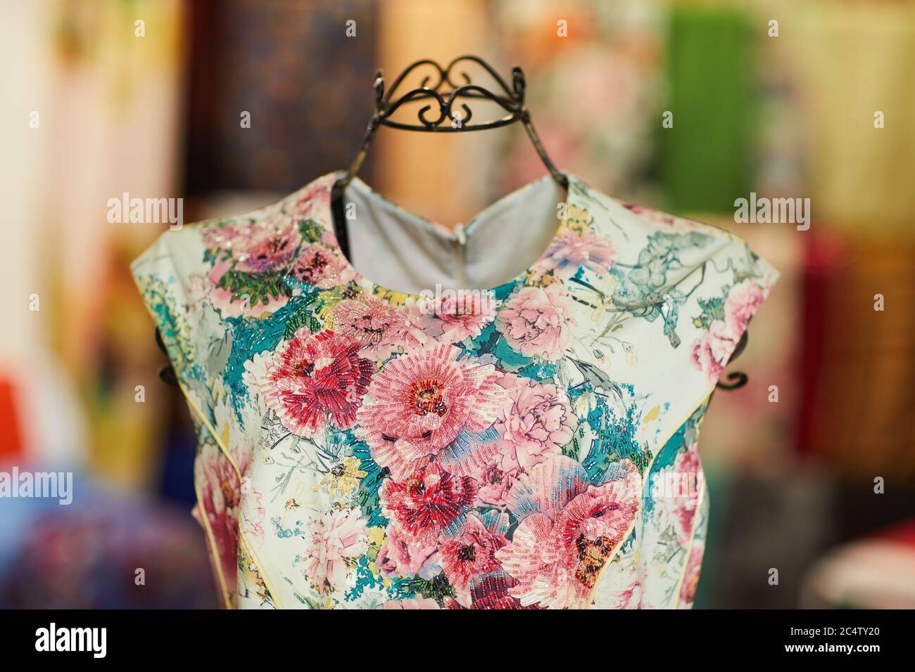 Female mannequin in pink dress in designers workplaces Stock Photo - Alamy