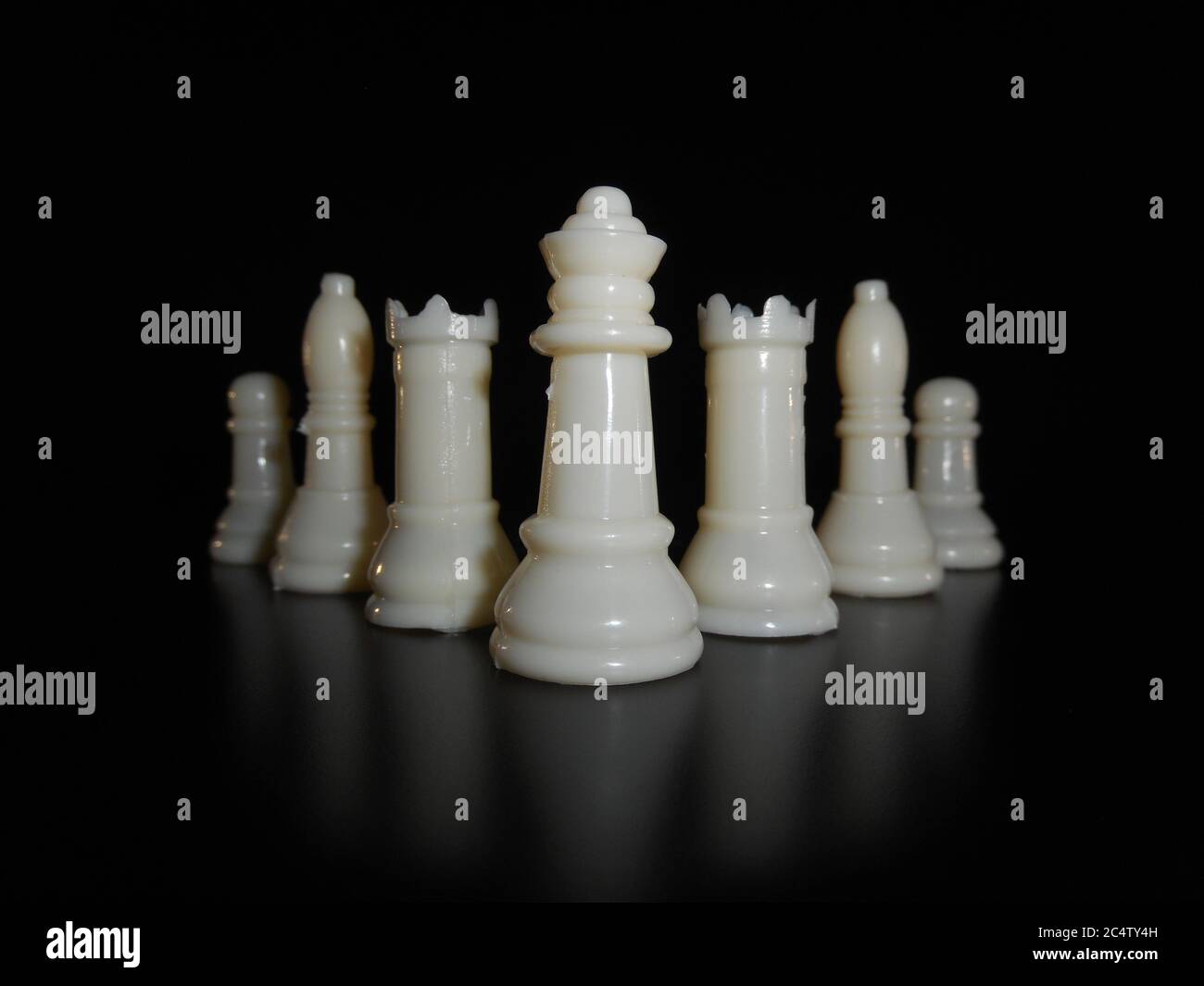 Chess photographed on portrait of black background Stock Photo - Alamy